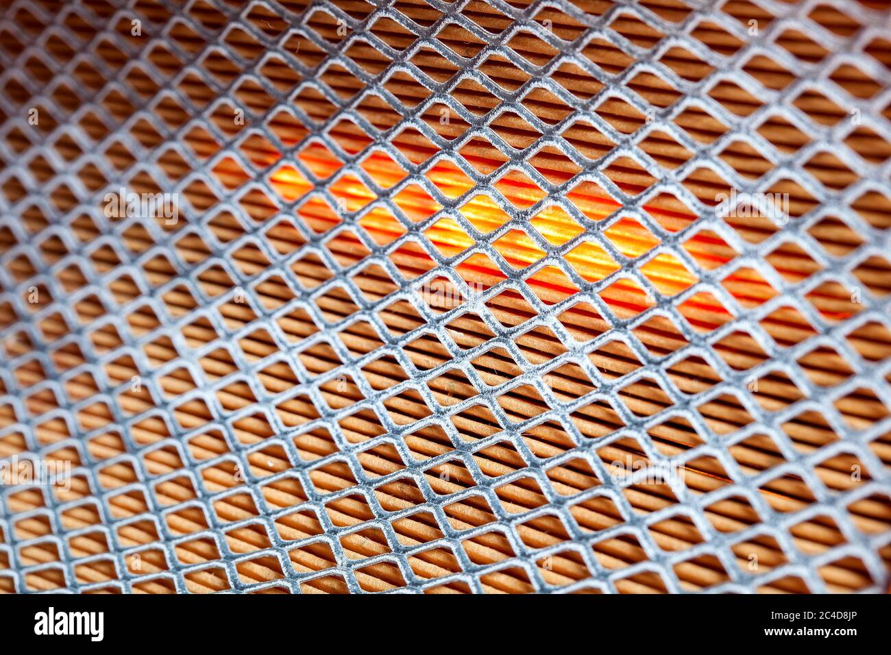 iron mesh frame of paper car air filter with active zone, close up of ...