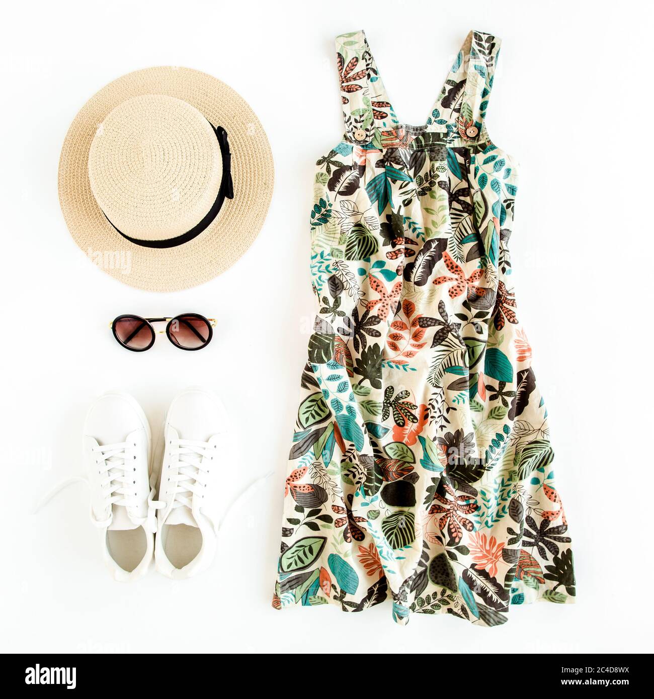 Female, summer street style. Sundress-dress, straw hat, sneakers ...