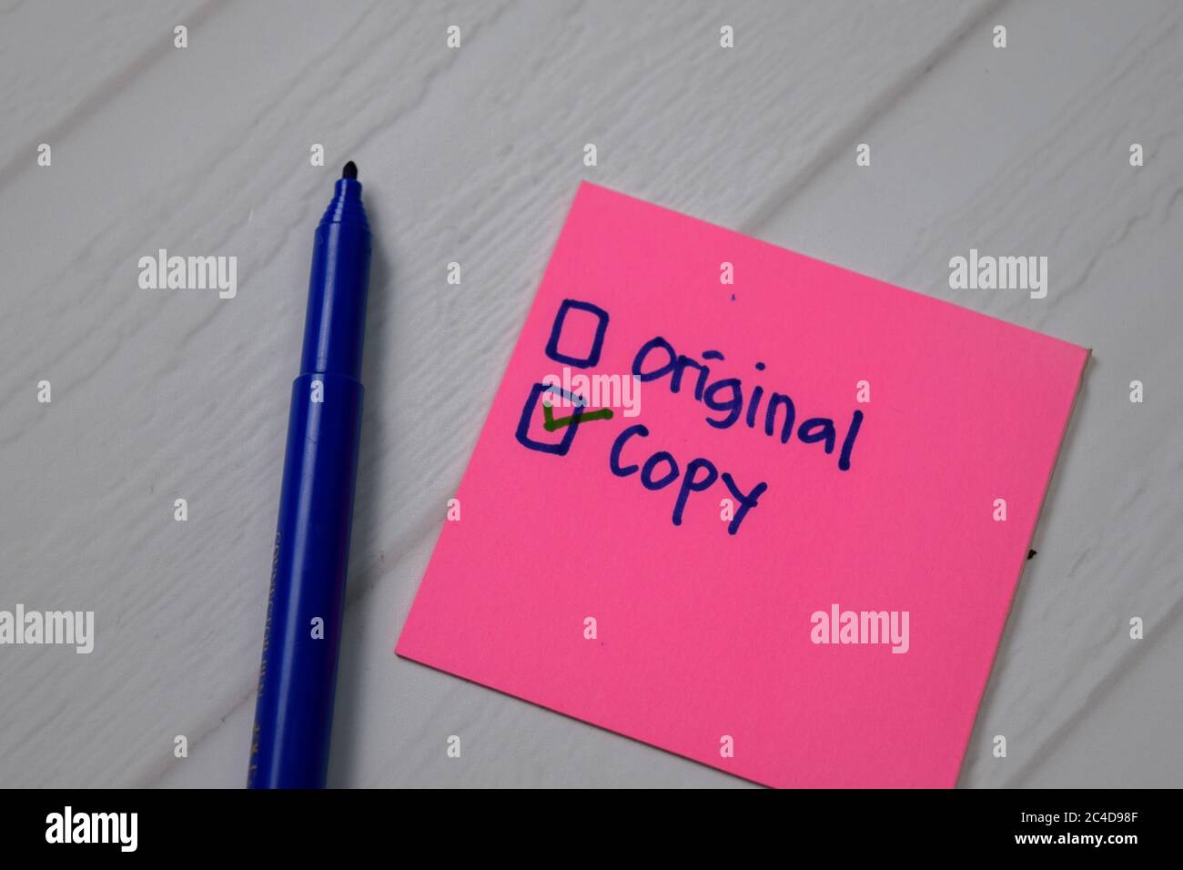 Copy and Original write on a sticky note. Supported by an additional ...