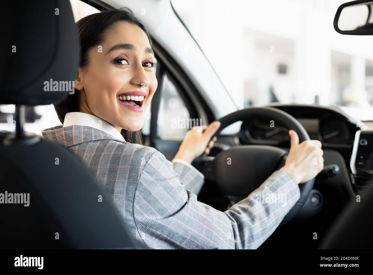 Woman car alone happy drive hi-res stock photography and images - Alamy