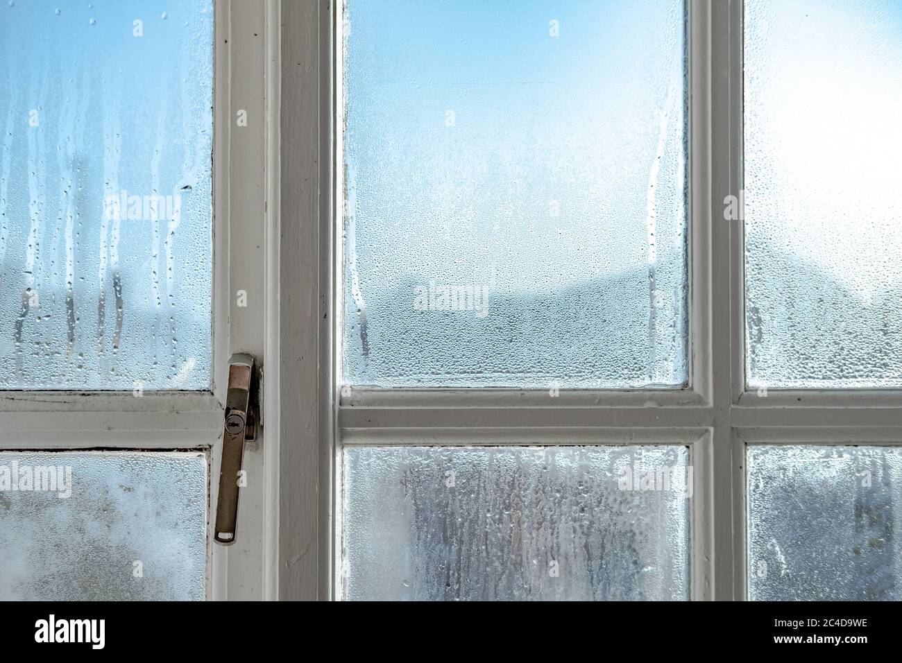 Interior of an old cottage, showing heavy water condensation on the ...