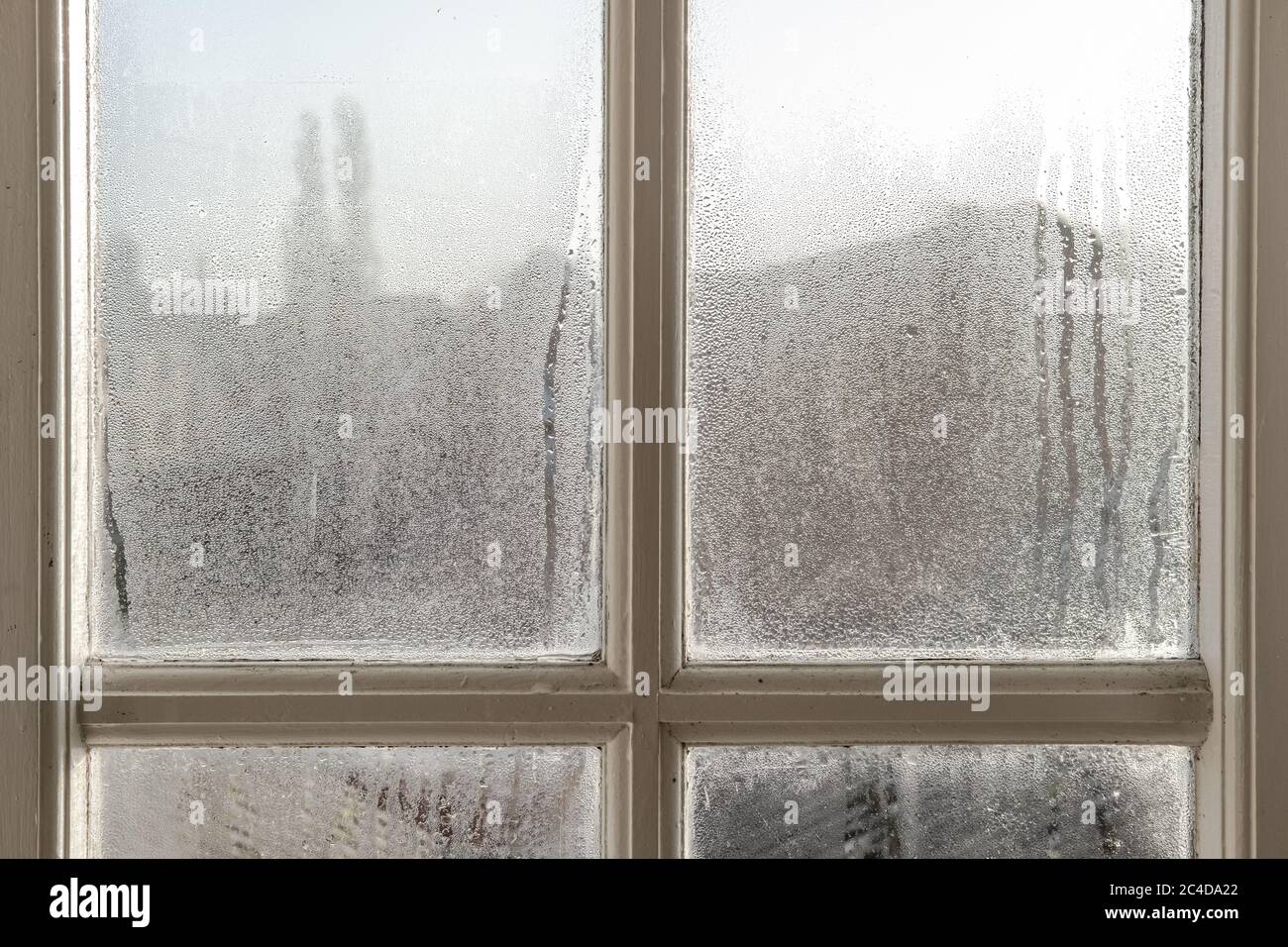 Interior of an old cottage, showing heavy water condensation on the ...