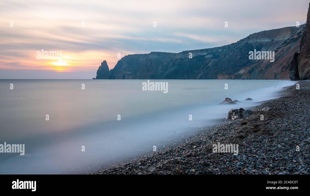 View of the sunset sea and the beach. Long exposure The concept of ...