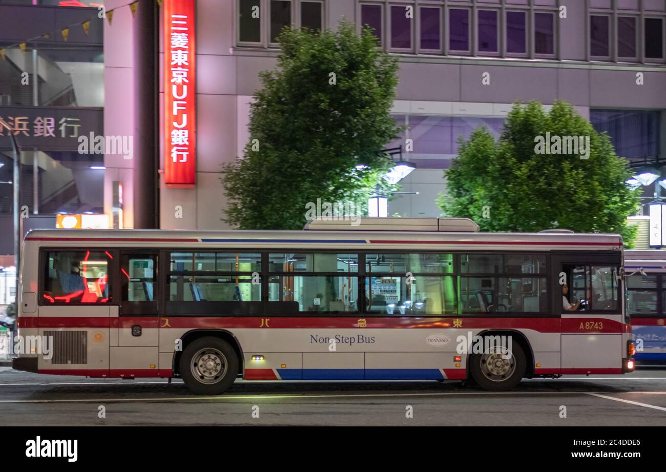 Local public bus at Shibuya Station, Tokyo, Japan at night Stock Photo ...
