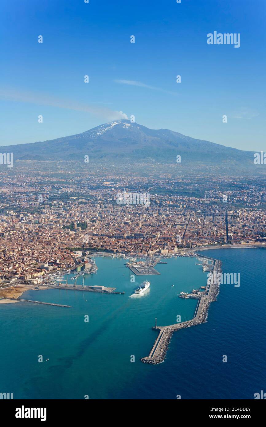 Bird's eye view of Catania city in Sicily with the Etna Vulcan in the ...