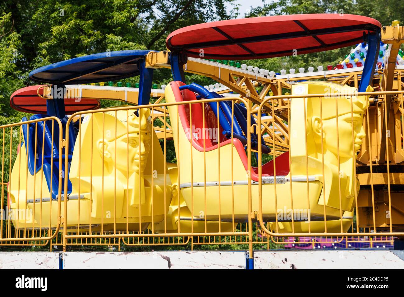 Yellow carousel booths with the image of the Egyptian Pharaoh Stock ...