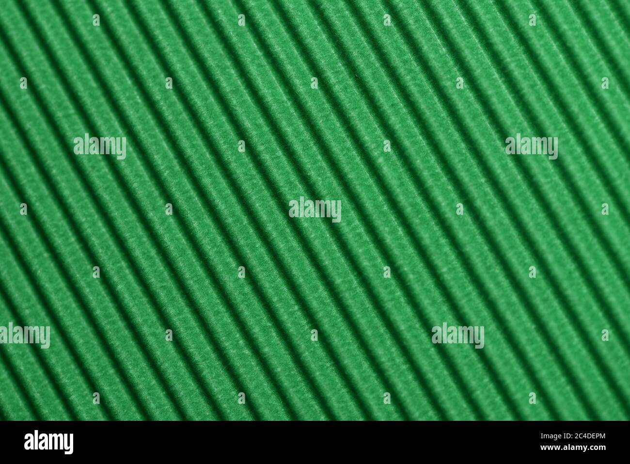 Light green colored corrugated cardboard texture useful as a background ...