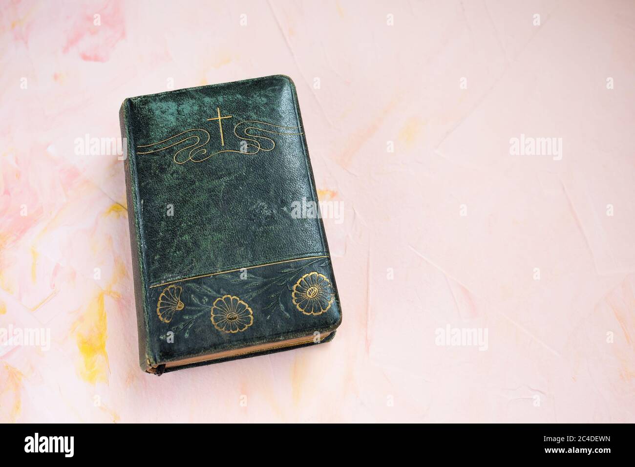 Bible or poetry book on pink, christian background Stock Photo - Alamy