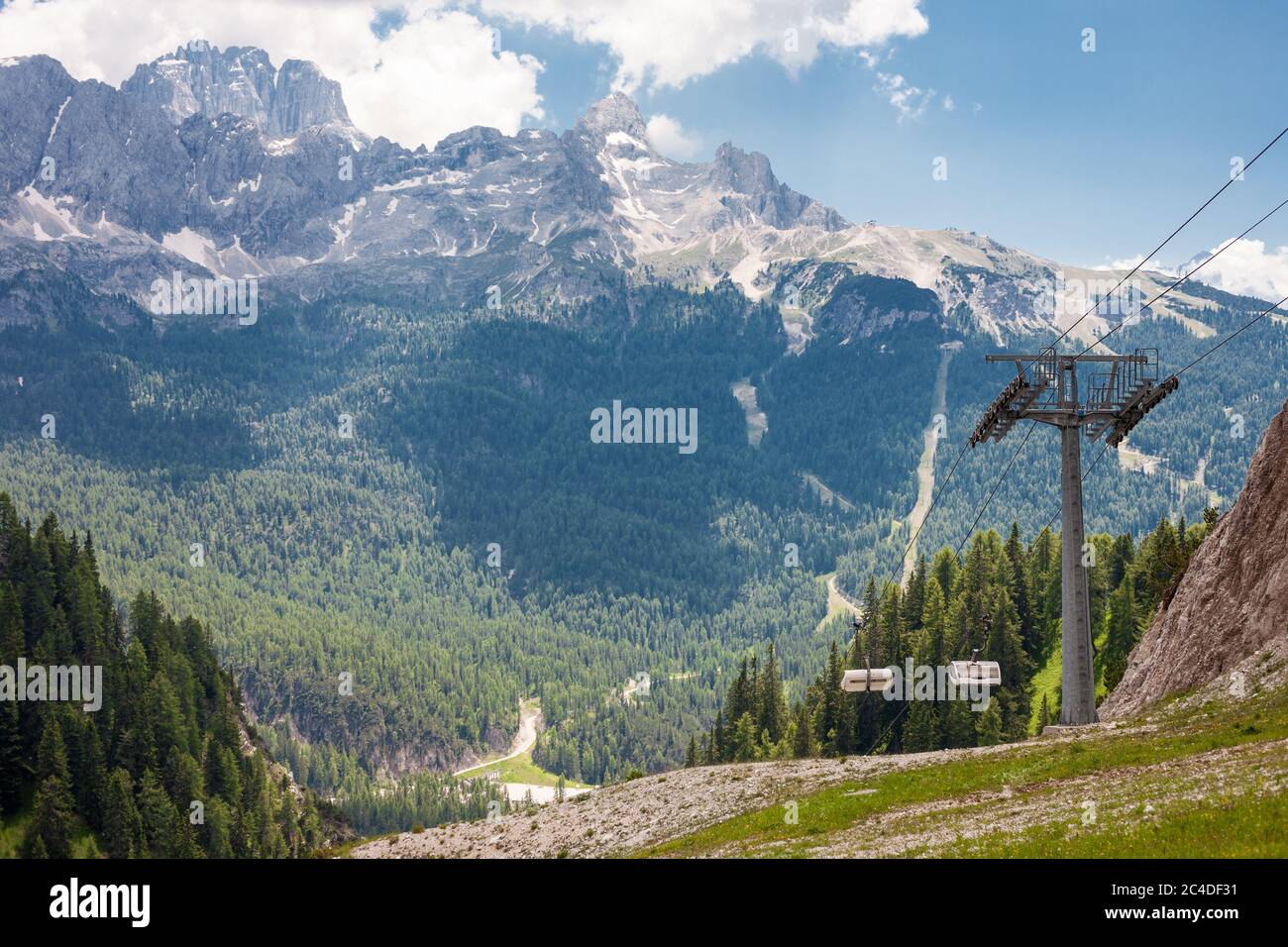 Landscape from the Dolomites with cable cars in the front in Italy ...