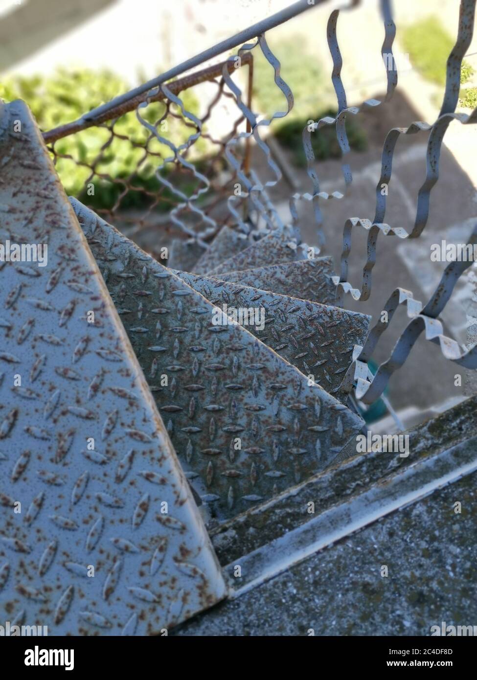 High angel shot of iron stairs in the summer garden Stock Photo - Alamy