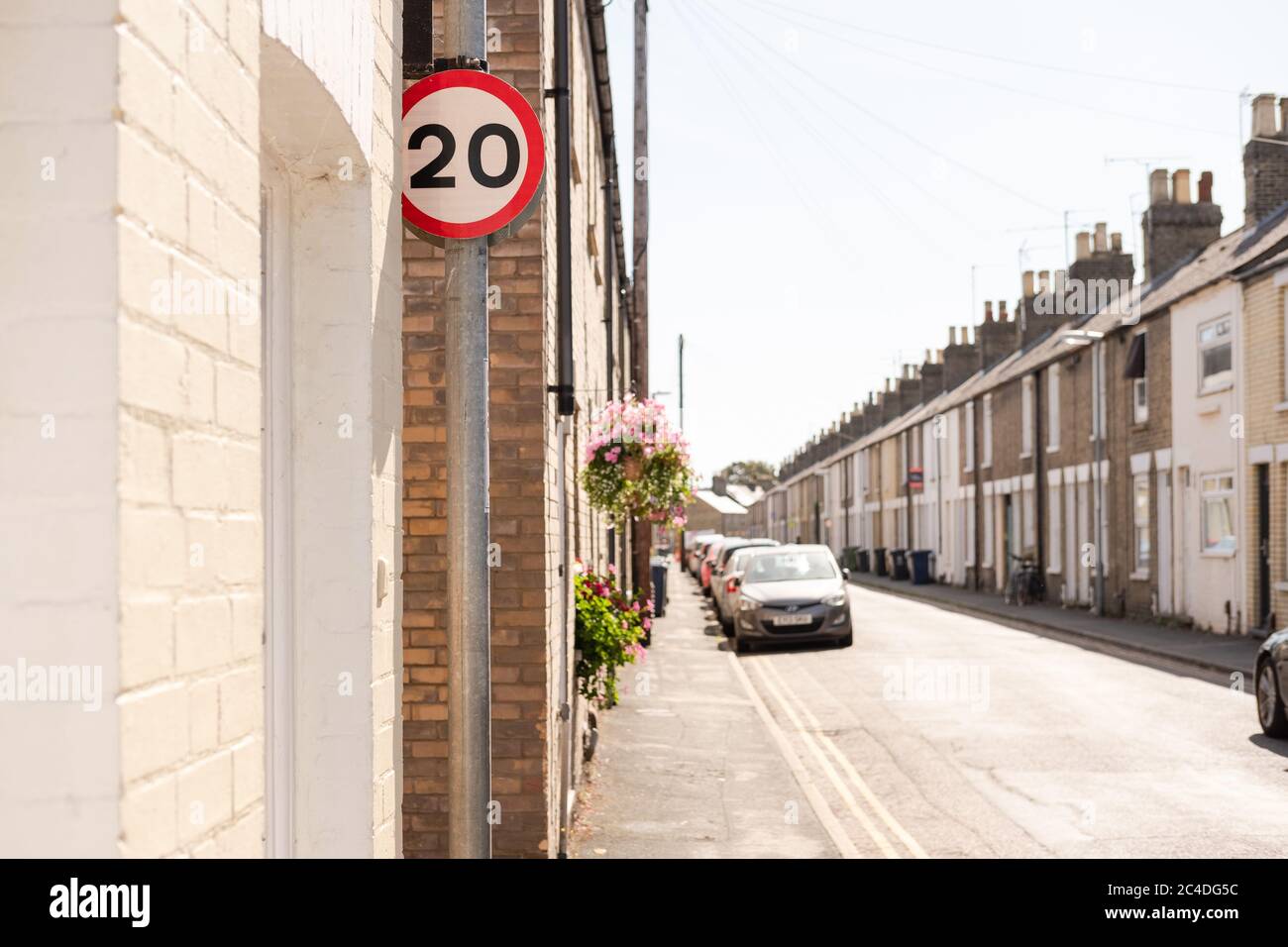 Terraced street showing a 20mph speed limit sign. The historic, old ...