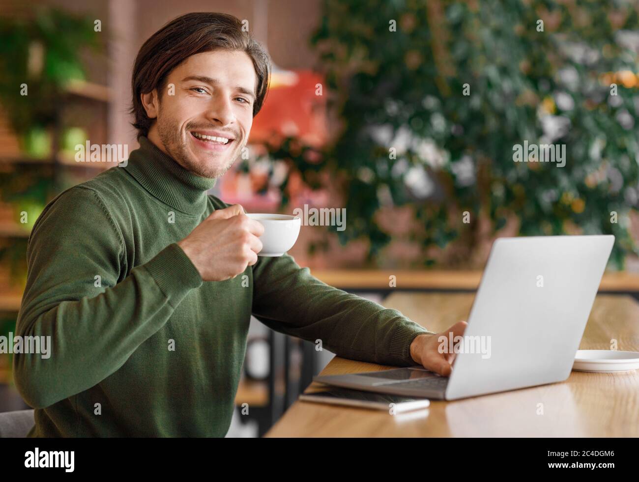Positive man programmer laptop hi-res stock photography and images - Alamy