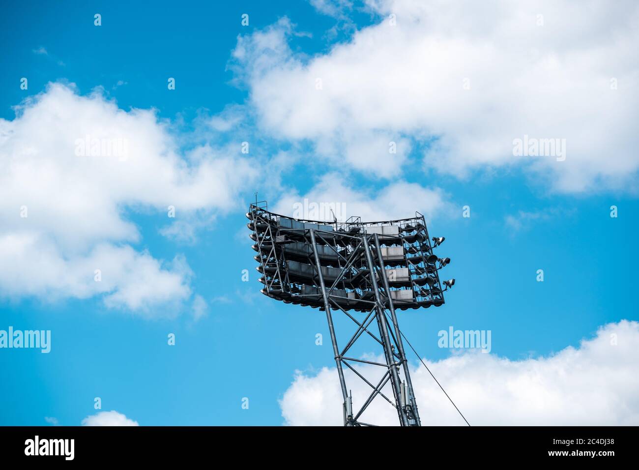 Low angle shot of a stadium projector captured during the daytime Stock ...