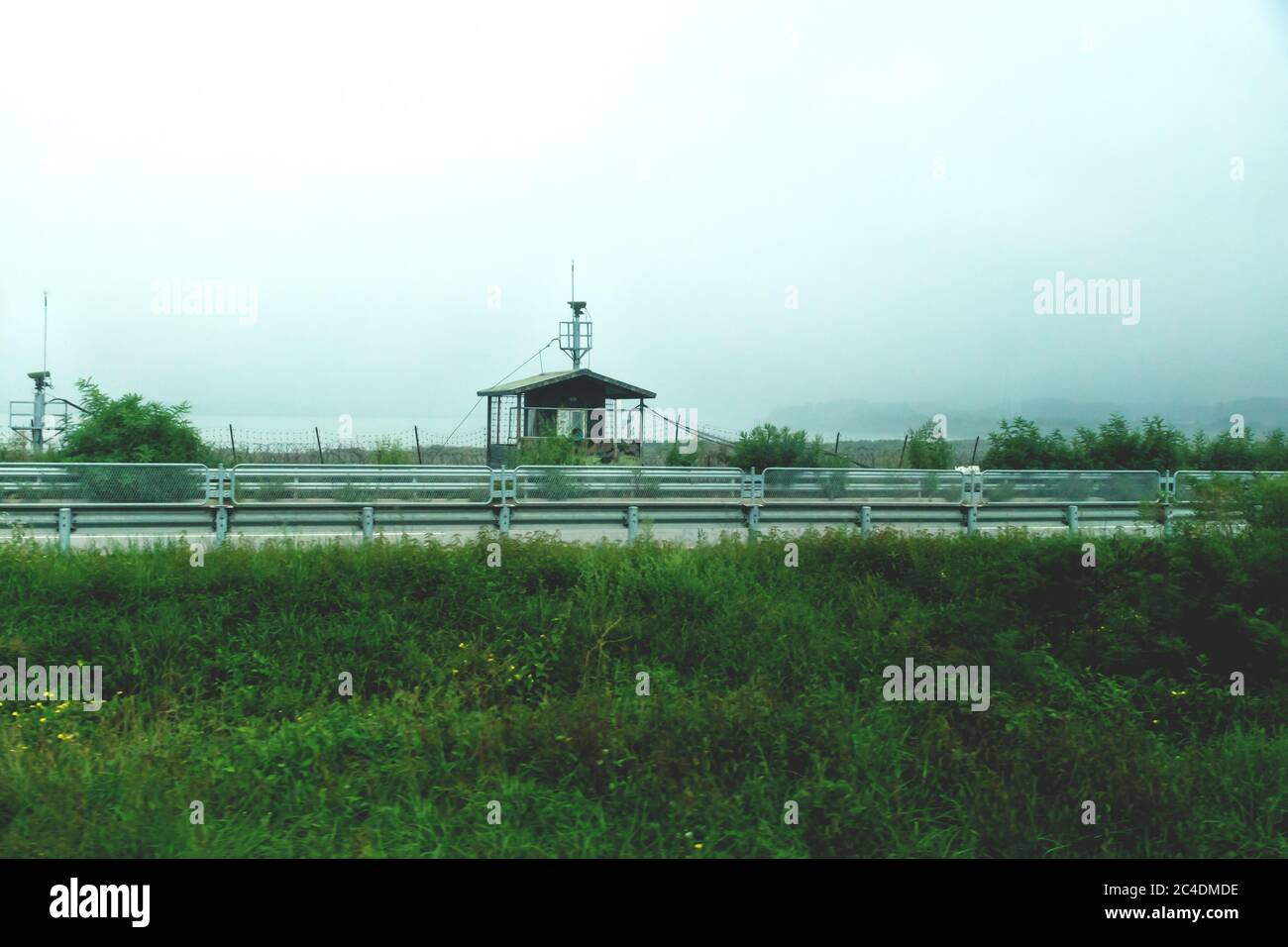 Observation post from South Korea at the barbed wire fenced border of ...