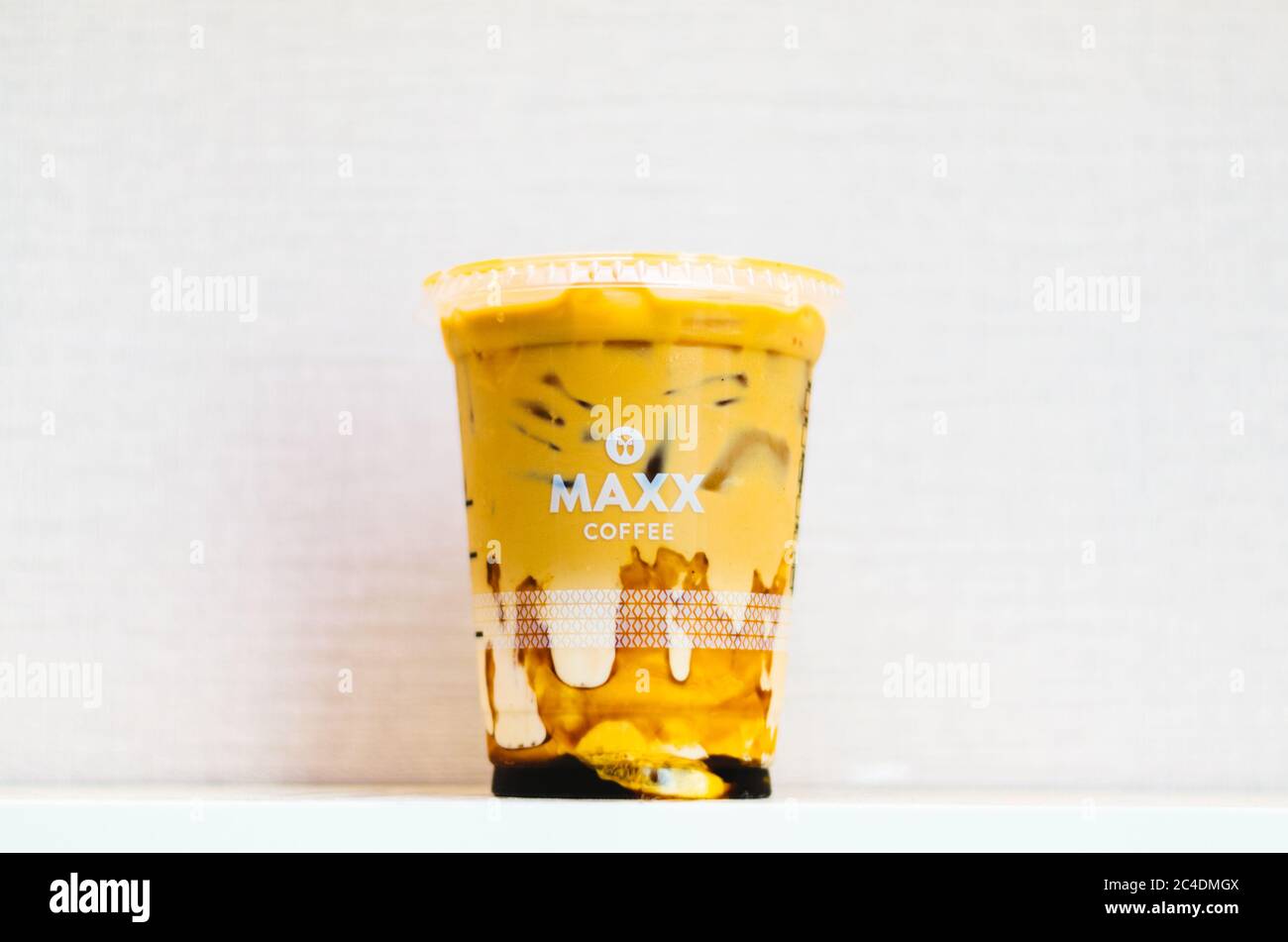 An illustrative editorial of the Maxx Coffee Iced Coffee with caramel ...