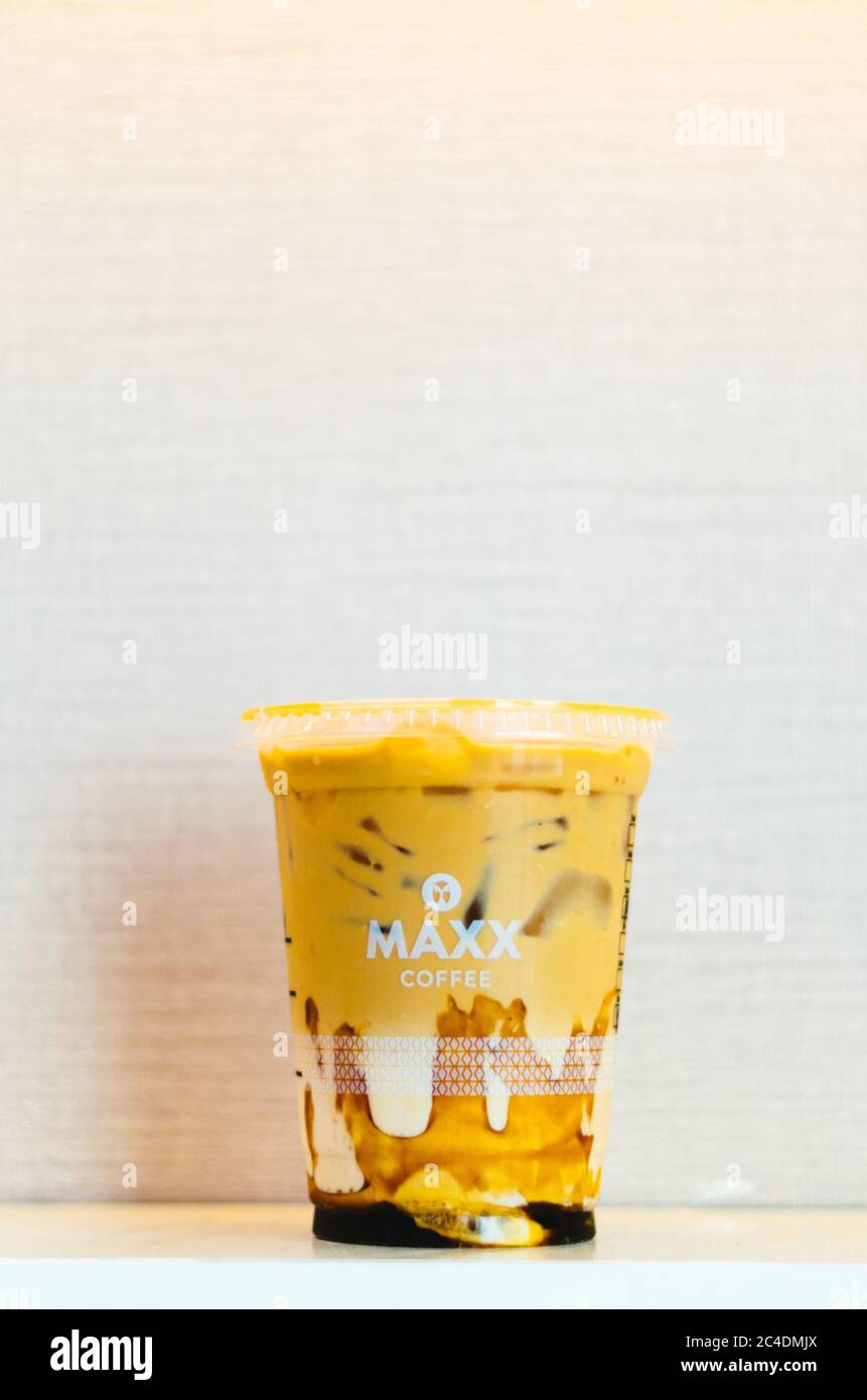 An illustrative editorial of the Maxx Coffee Iced Coffee with caramel ...