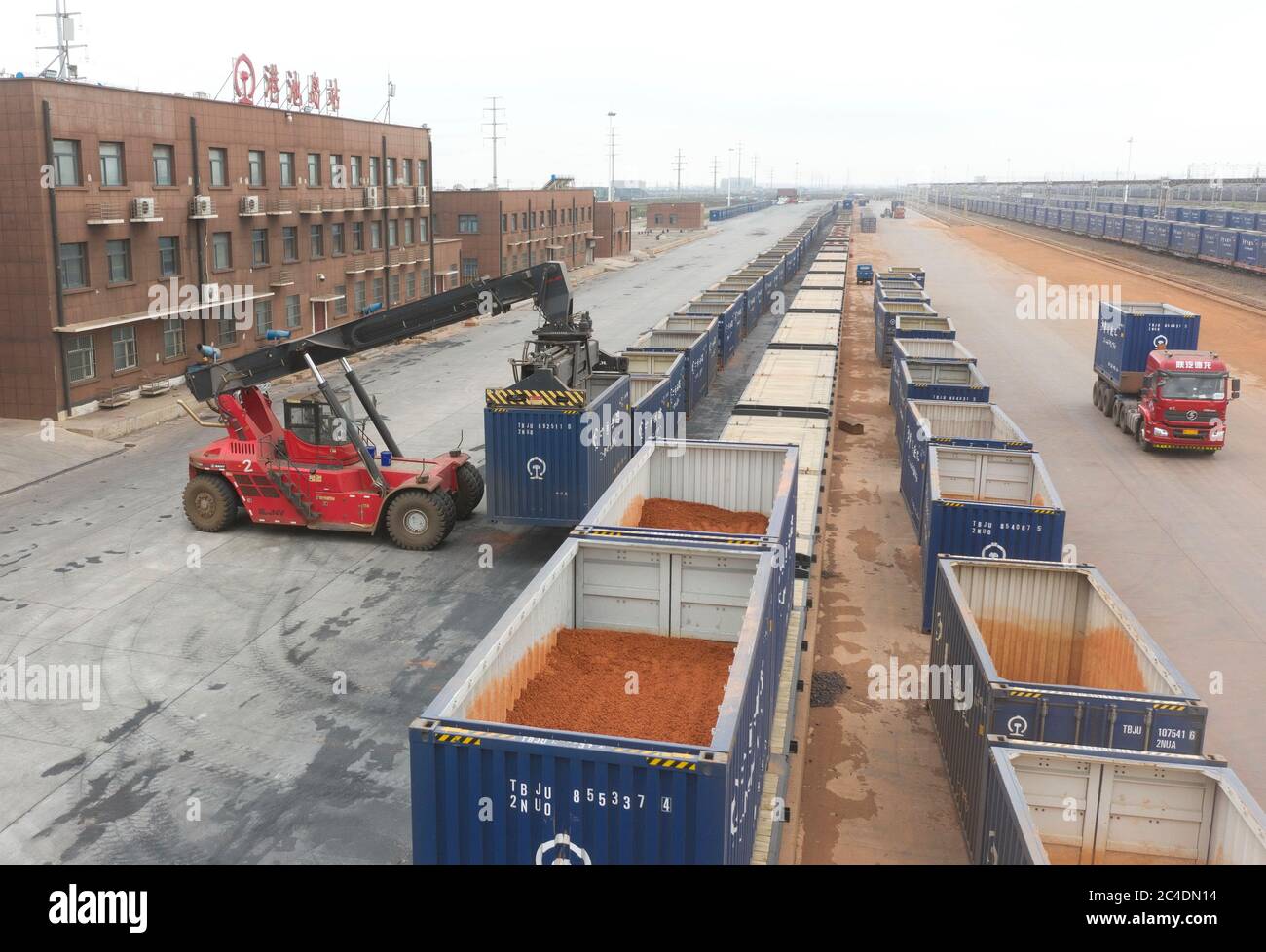 Container handling open top hi-res stock photography and images - Alamy