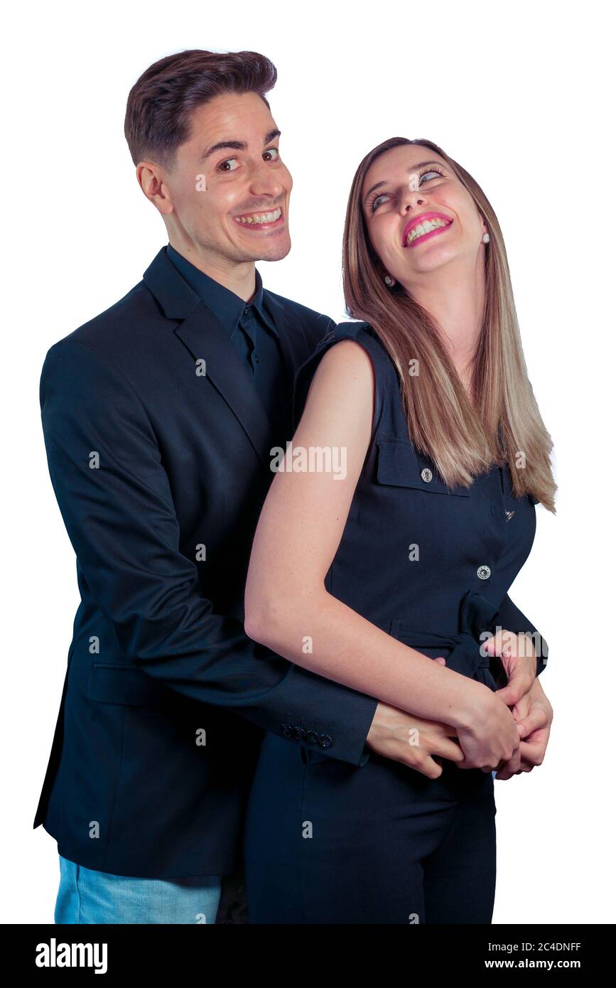 Young couple making funny faces and gestures on a white background ...