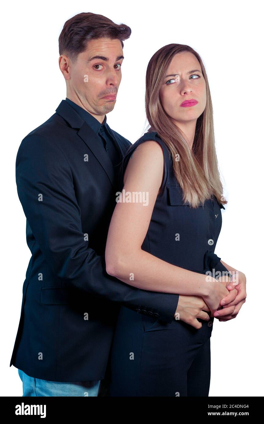 Young couple making suspicion gestures on a white background Stock ...