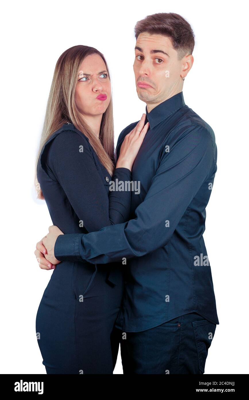 Young couple making suspicion gestures on a white background Stock ...