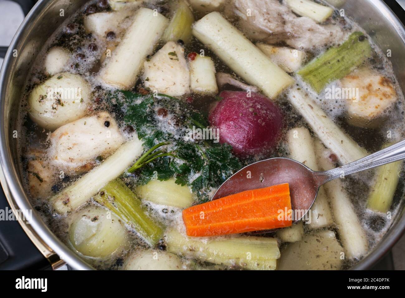 Chef at work: How to make a broth. Step by step, tutorial Stock Photo ...