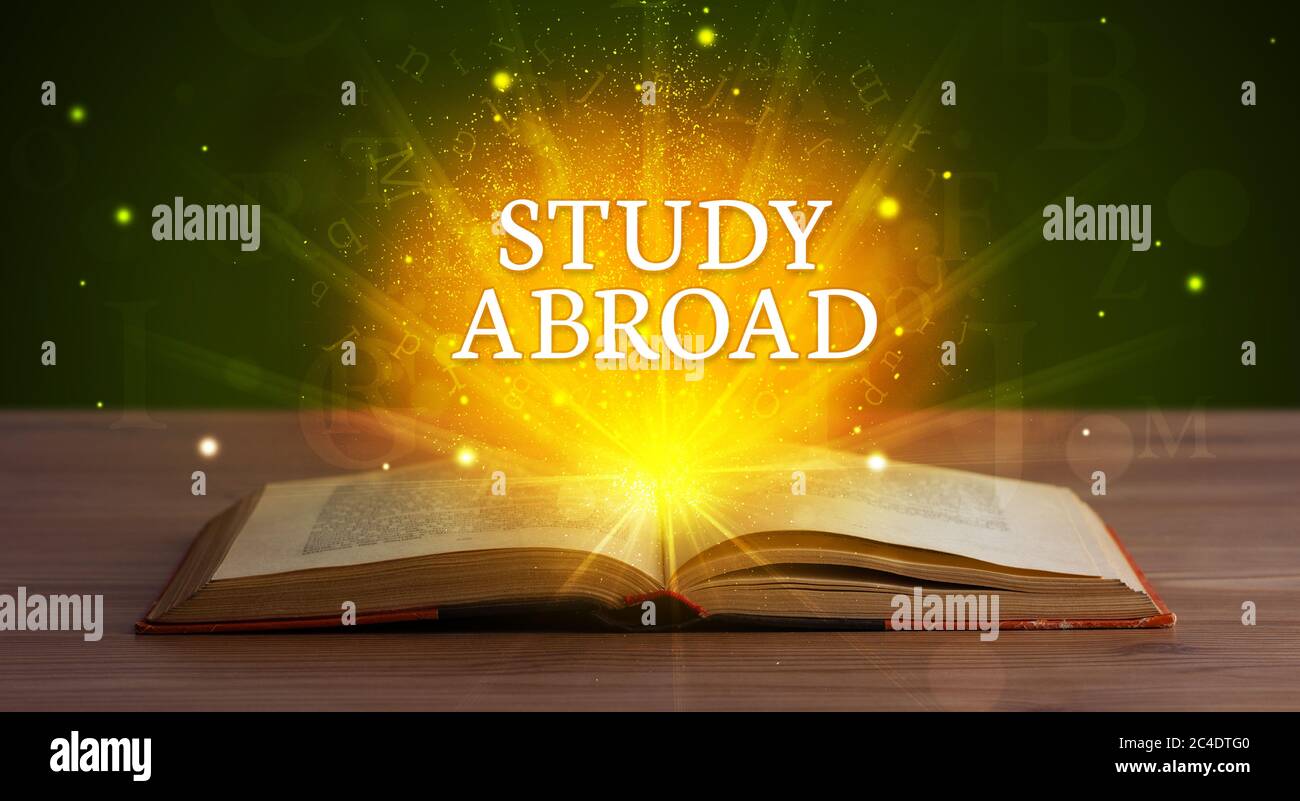 STUDY ABROAD inscription coming out from an open book, educational ...