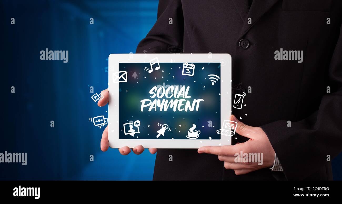 Young business person working on tablet and shows the inscription ...