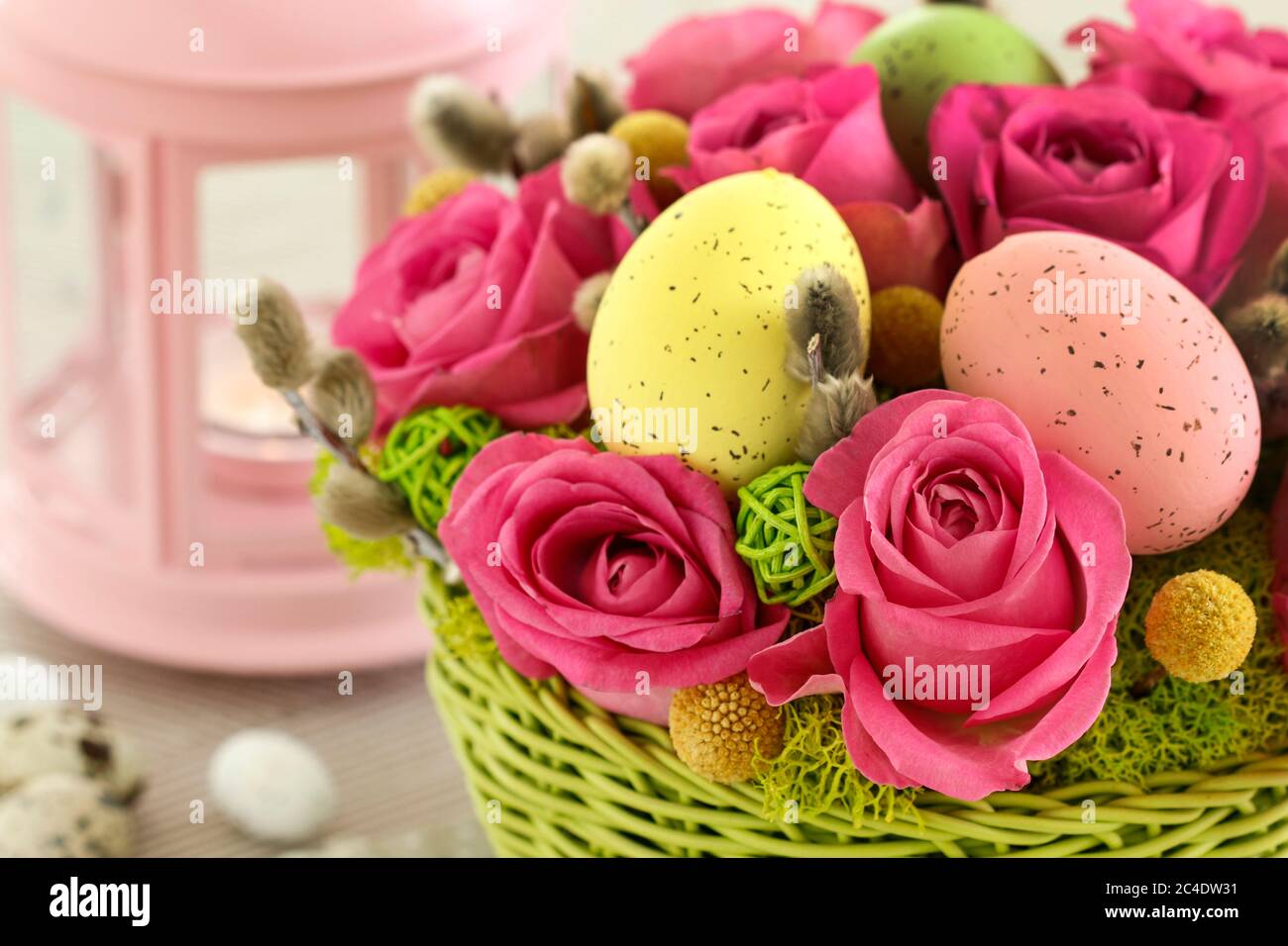 Florist at work: woman shows how to make Easter table decoration with ...