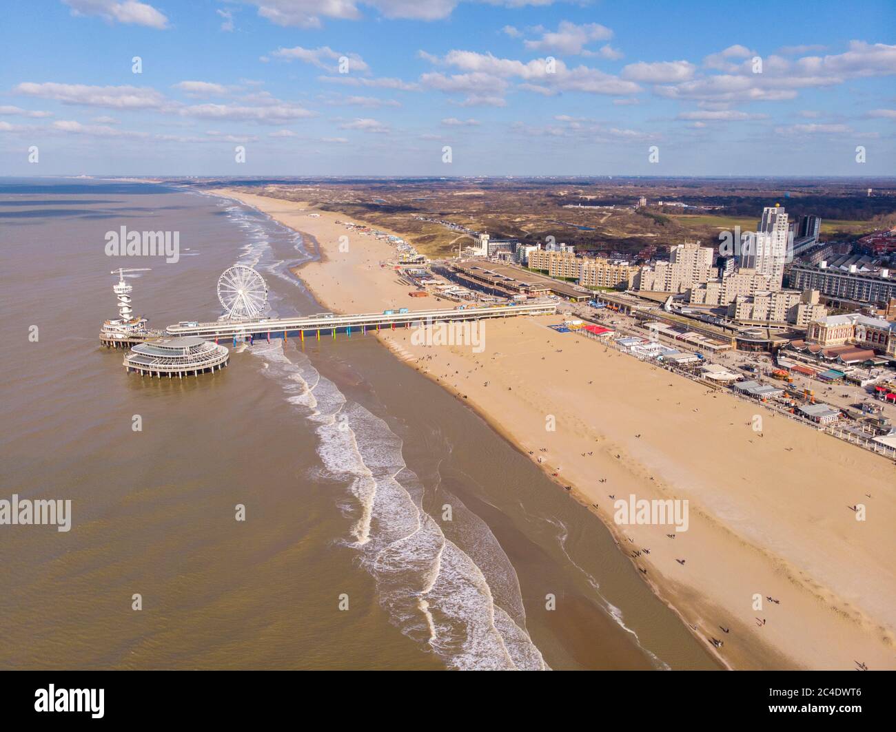 Pier with Ferris Wheel at Northern Sea Scheveningen Beach , located ...