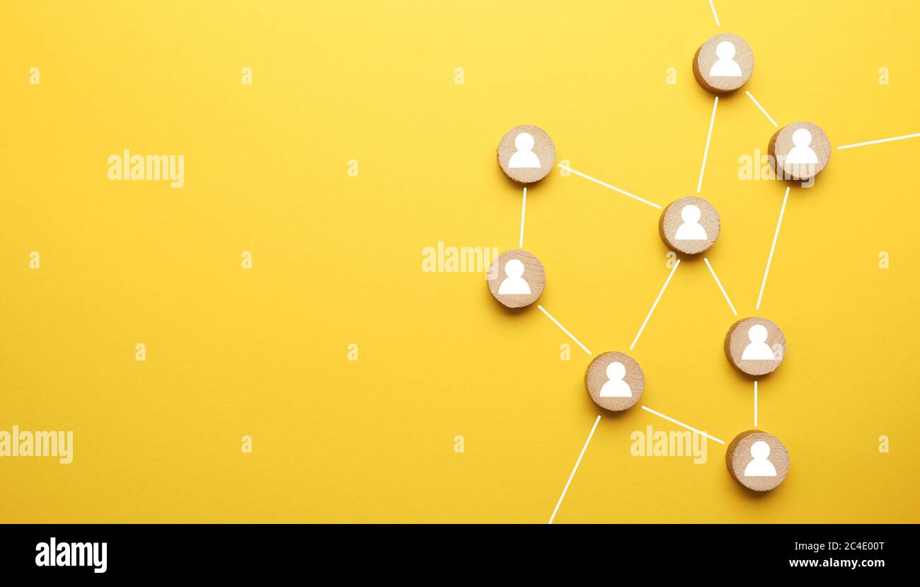 Abstract teamwork, network and community concept on a yellow paper ...