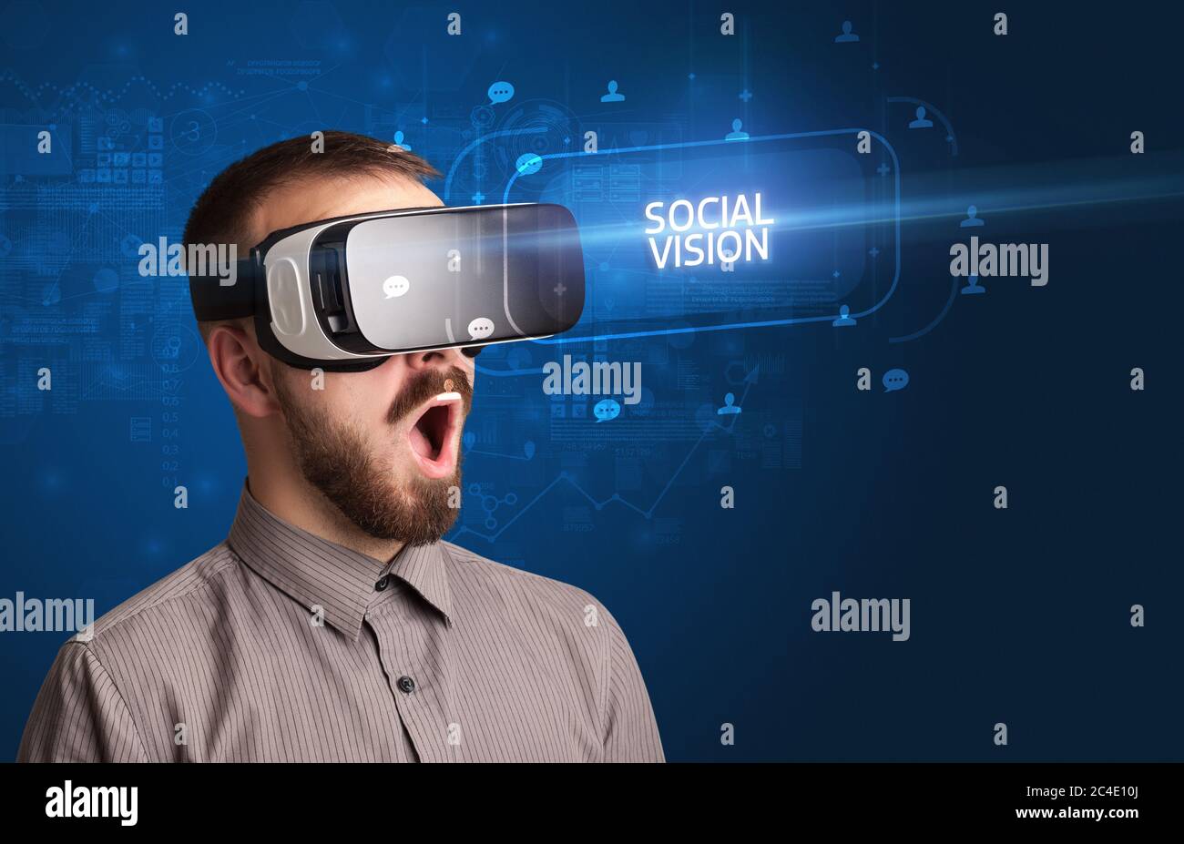 Businessman looking through Virtual Reality glasses with SOCIAL VISION ...