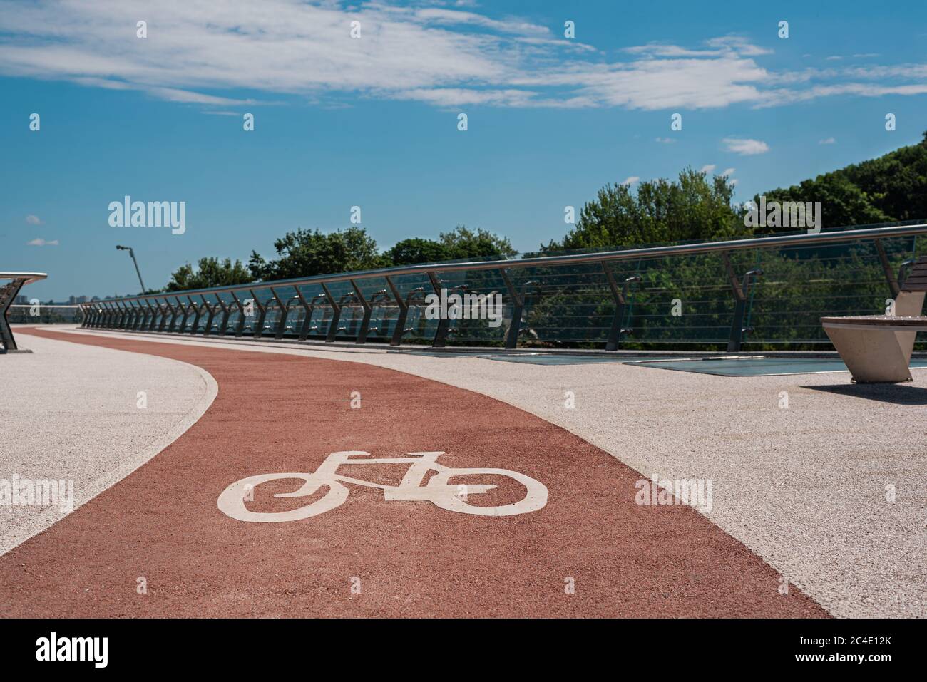 Bike path with of bicycle symbol. Pink bike lane with non-slip acrylic ...