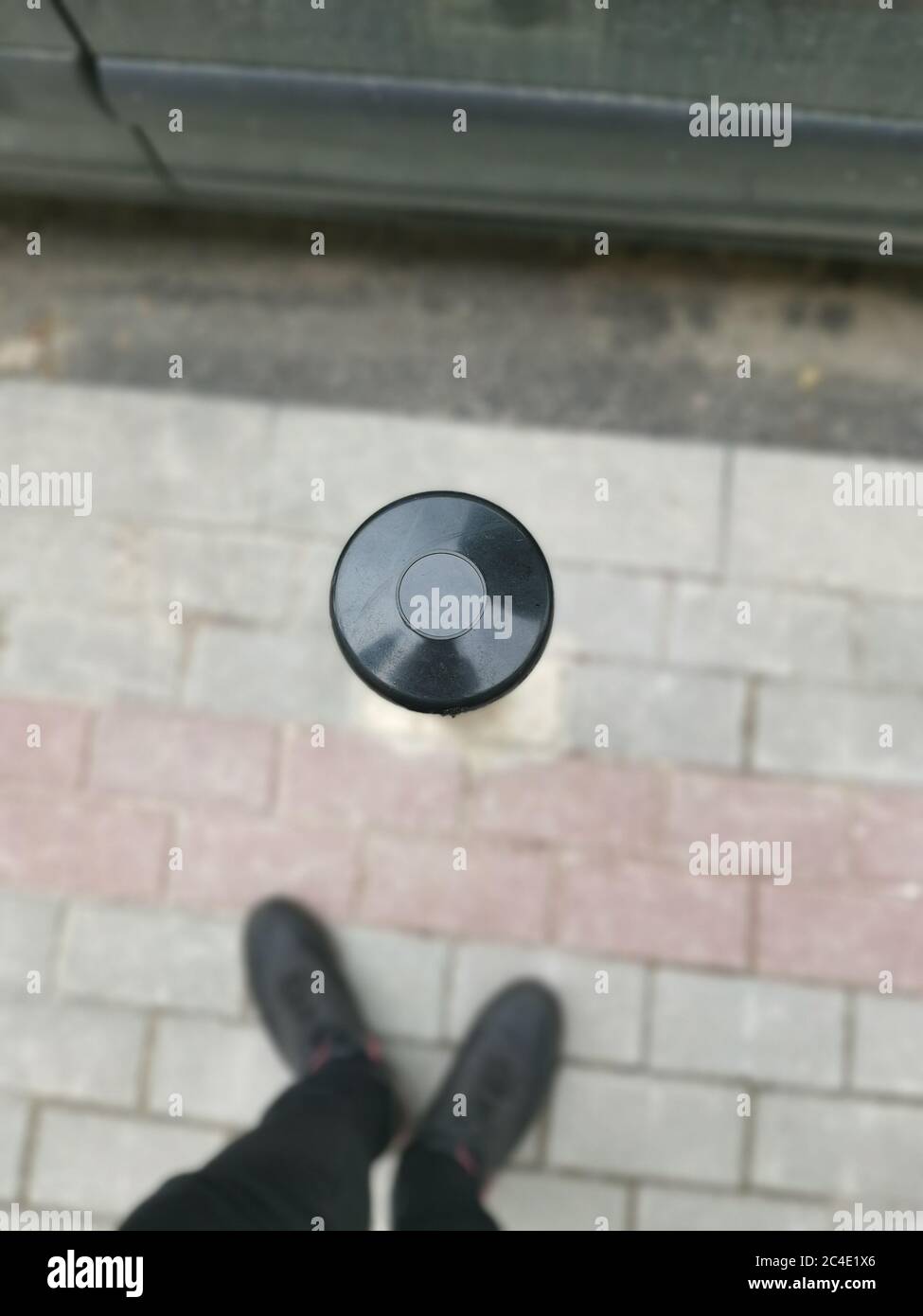 Sidewalk pole shot directly from above Stock Photo - Alamy
