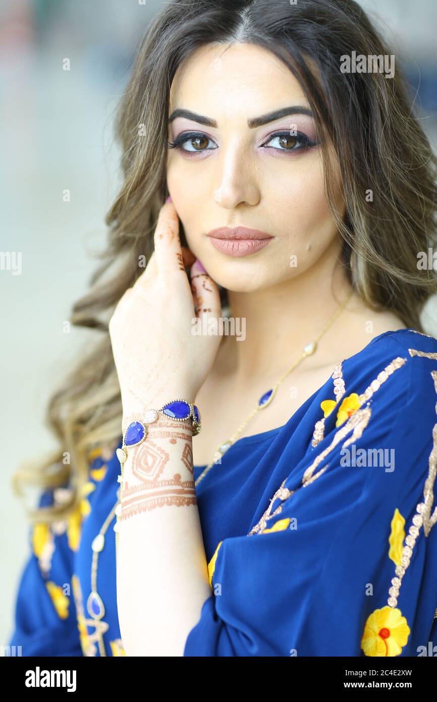 Arab Women in Light Blue Traditional arab Dress Stock Photo - Alamy