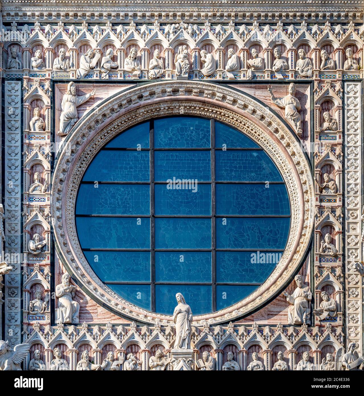 Circular window in the front facade of Siena Cathedral. Siena, Italy ...