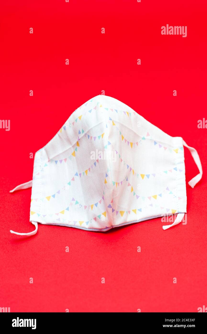 White with colorful triangular flags patterned DIY fabric face mask for ...
