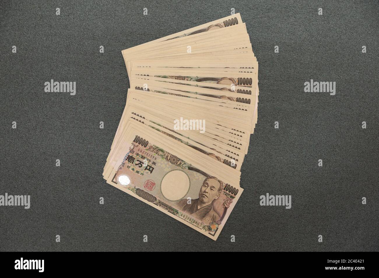 Yen - Japanese paper currency. Banknotes of 10,000 yen stacked ...