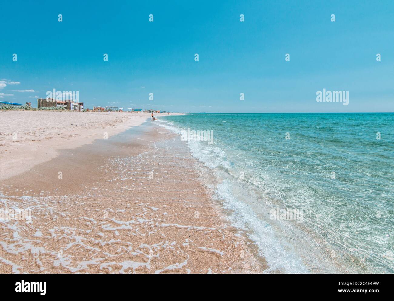 Empty, deserted beach with white sand and crystal clear azure sea ...