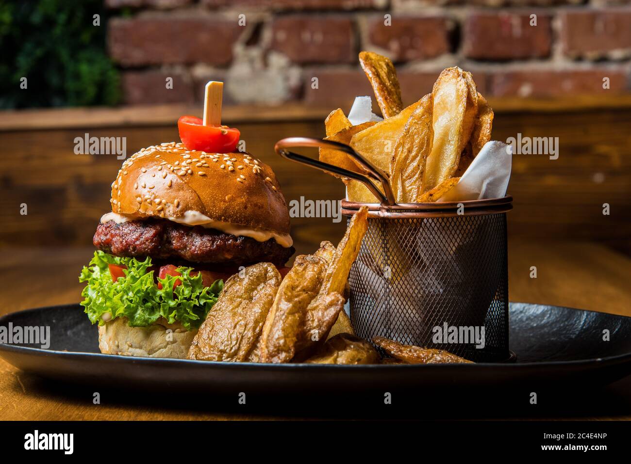 Burger and fries Stock Photo - Alamy
