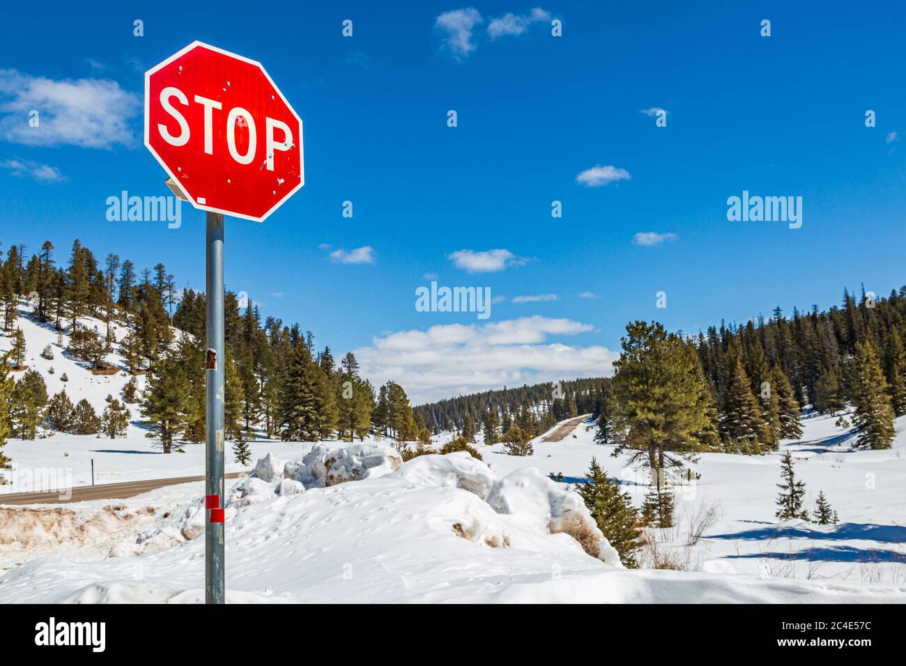 A Stop Sign in a Snowy Utah Landscape Stock Photo - Alamy