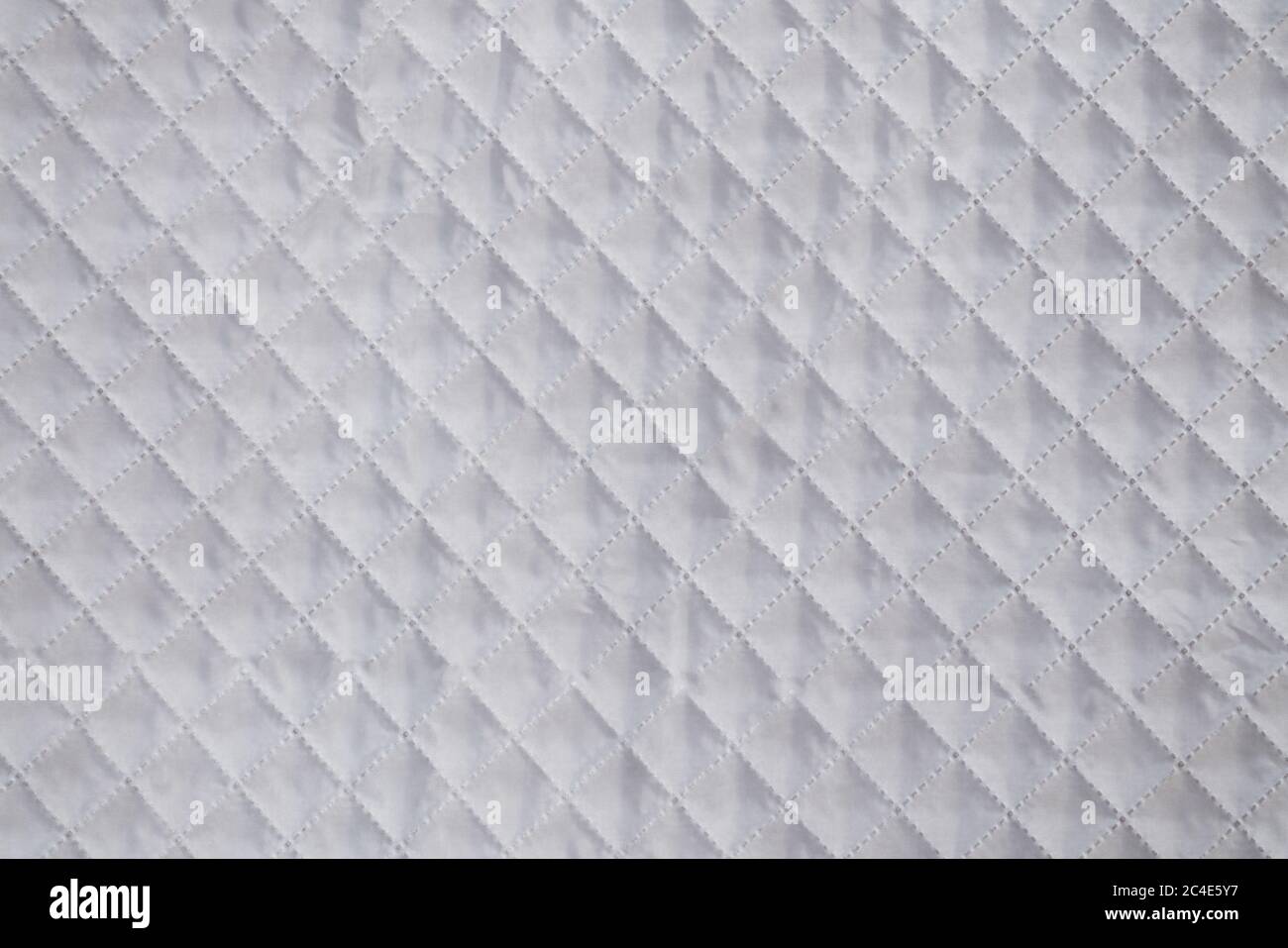 White textile texture with checkered mesh embossing. Abstract fabric ...