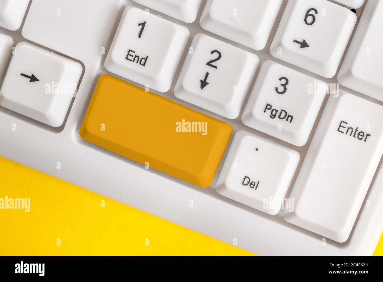 Different Colored Keyboard key With Accessories Arranged On Empty copy ...