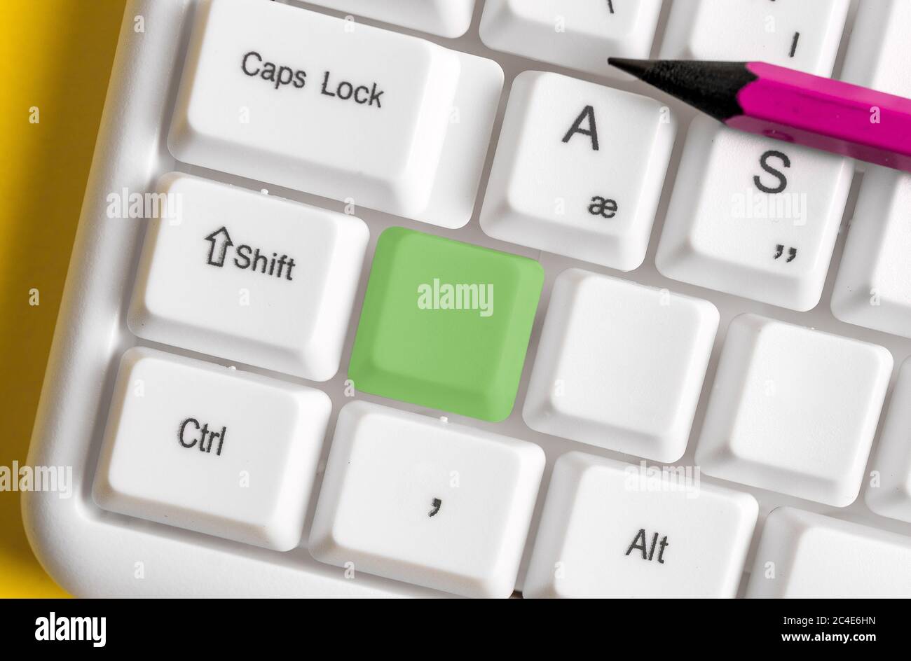 Different Colored Keyboard key With Accessories Arranged On Empty copy ...