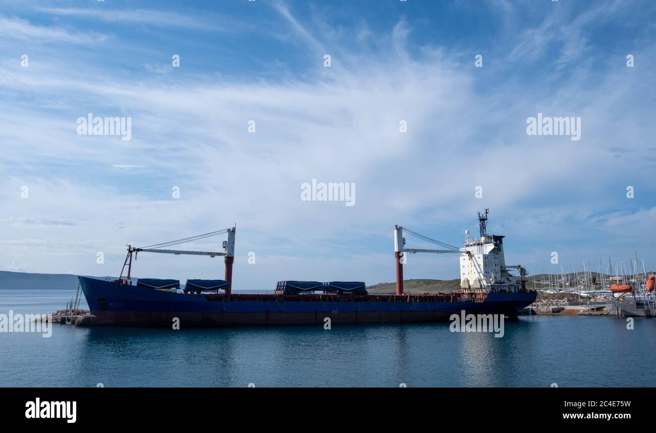 Old oil tanker moored at harbor. Ships anchored at port, city of ...