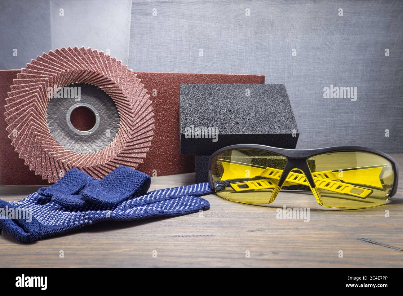 Various grinding tools - sanding belt, abrasive sponge and flap disc ...