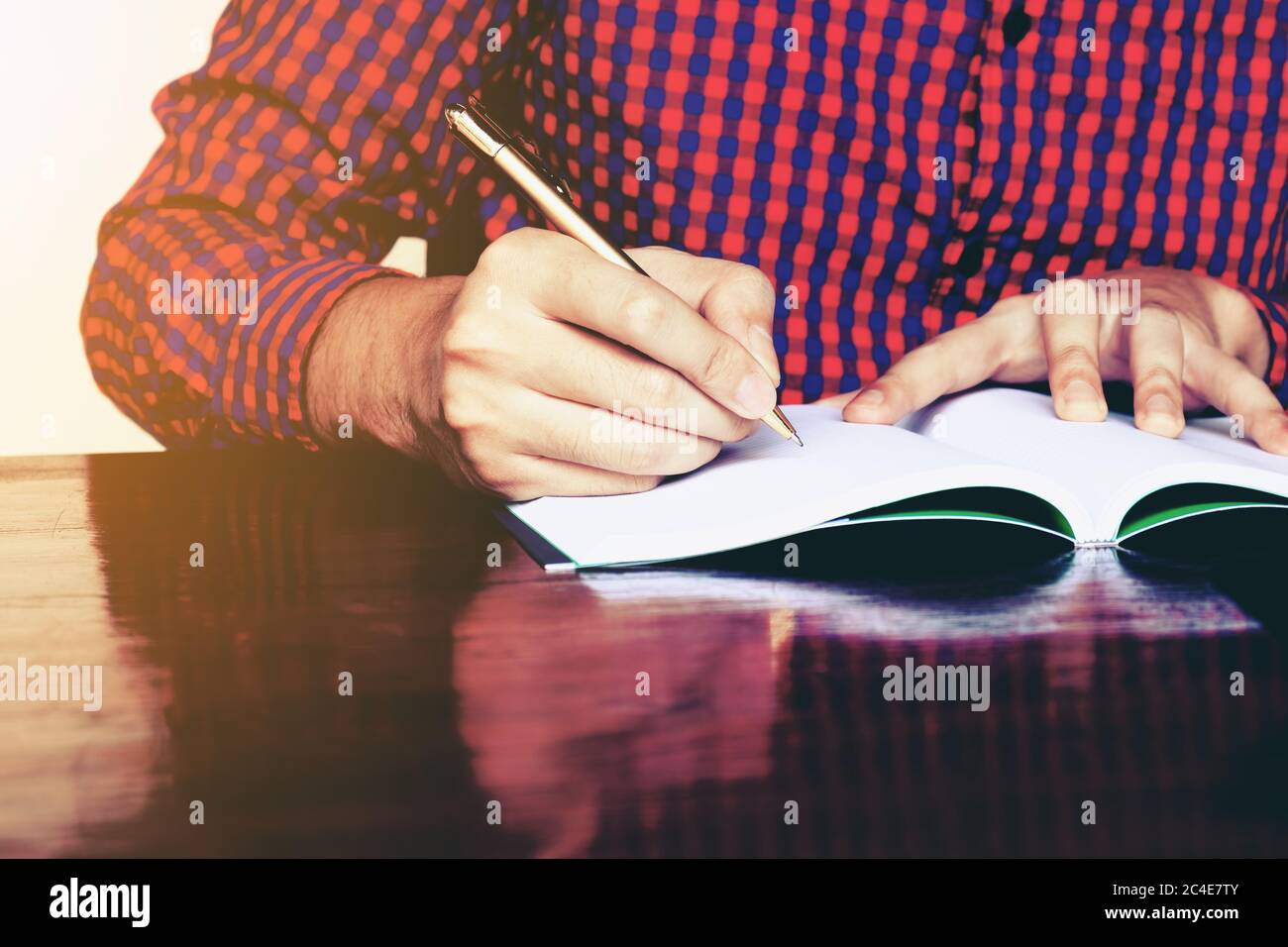 Man hand writing studying hi-res stock photography and images - Alamy