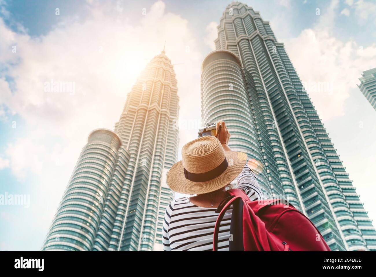 Kuala Lumpur, Malaysia – MARCH 12, 2019: Young female tourist making ...