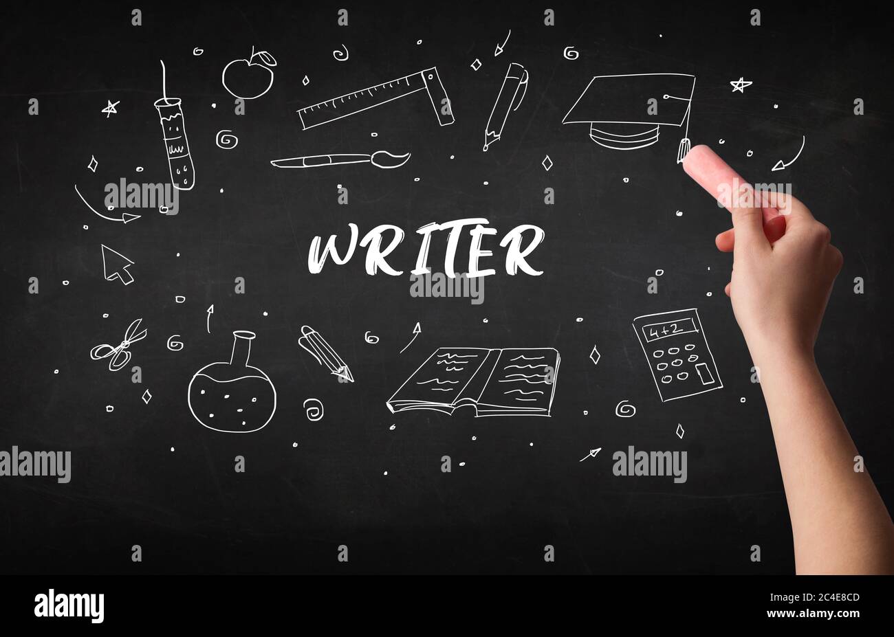 Hand drawing WRITER inscription with white chalk on blackboard ...