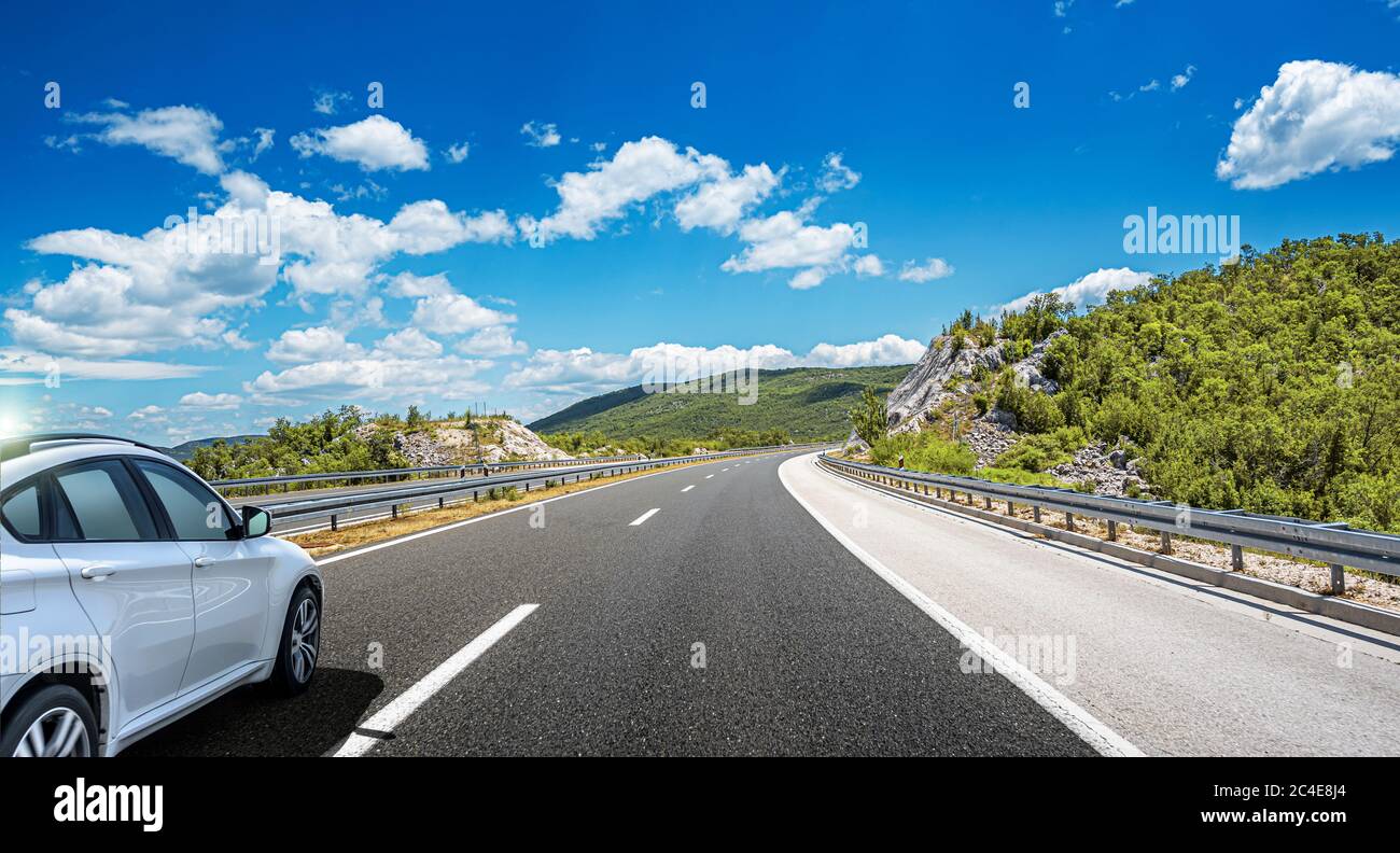 Car moves on mountain road hi-res stock photography and images - Alamy