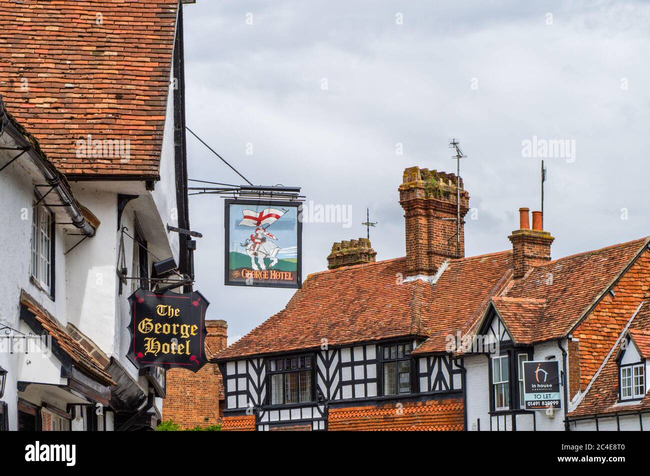 Sign for the George Hotel, a 15th century coaching inn, in the town of ...